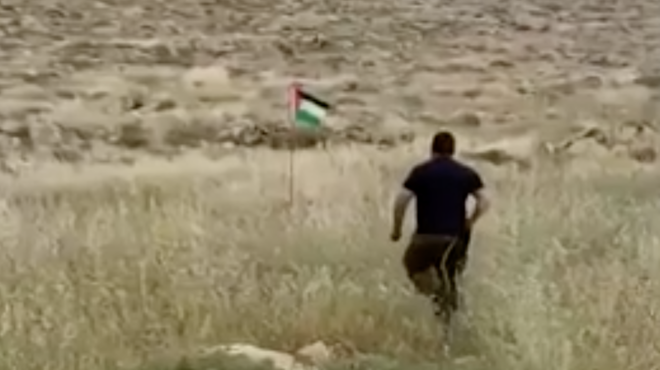 NTV Kenya: Palestinian flag explodes when Israeli man tries to remove it